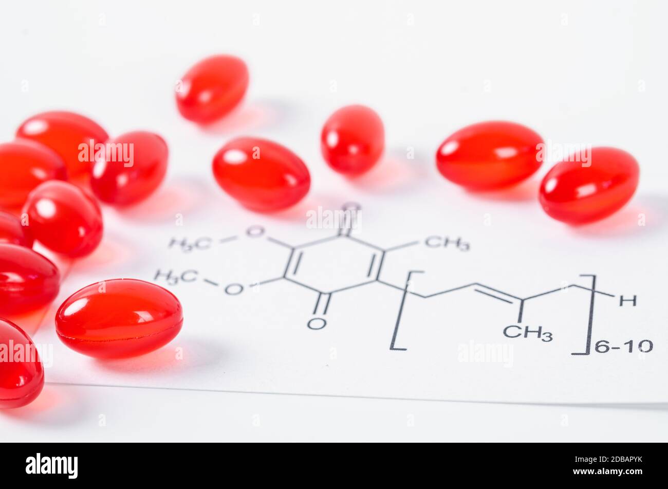 Vitamin Coenzyme Q10 with chemical formula on a white background. To ...