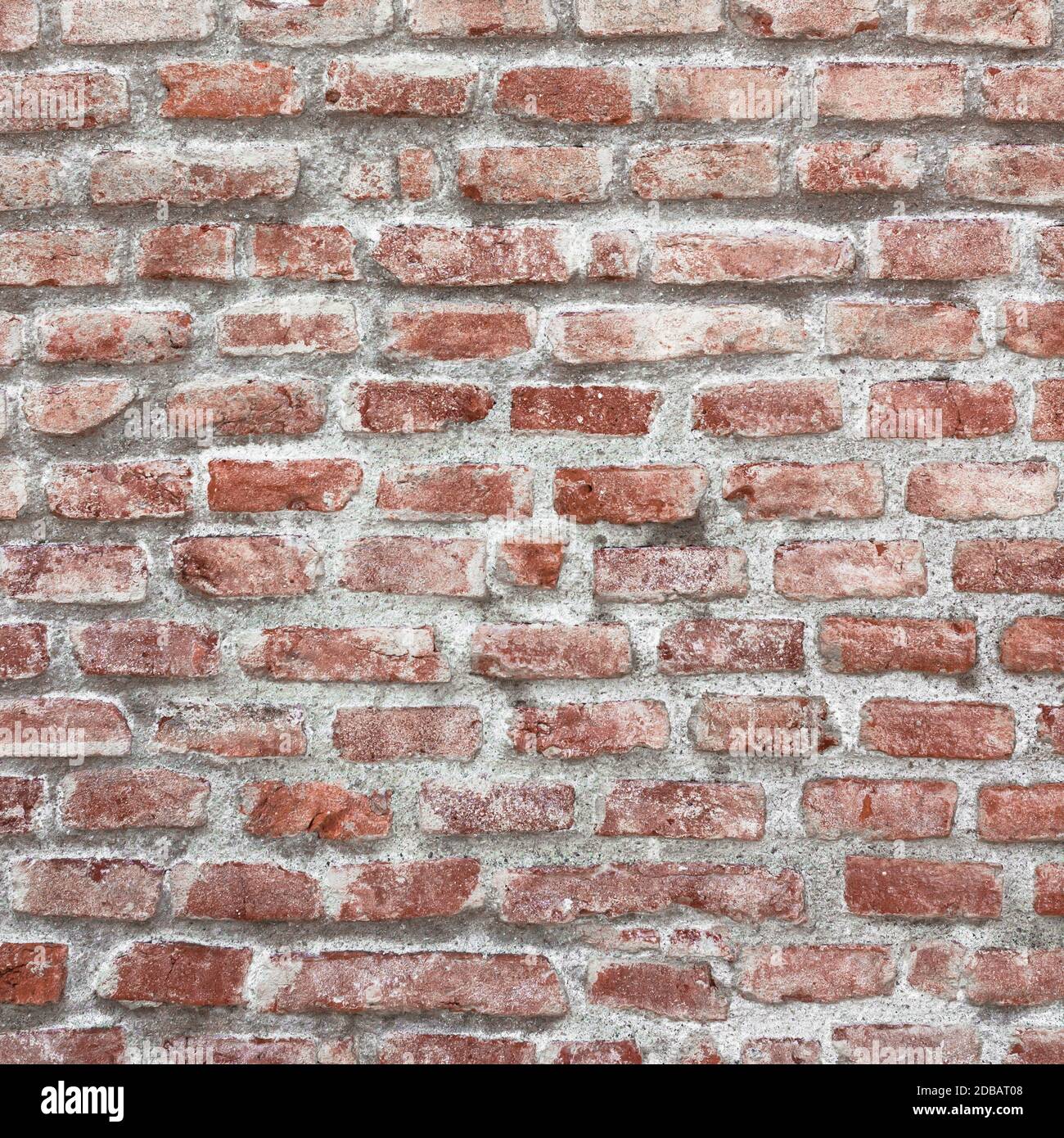 Ancient stone masonry. Fragment of a brick wall of an ancient structure ...