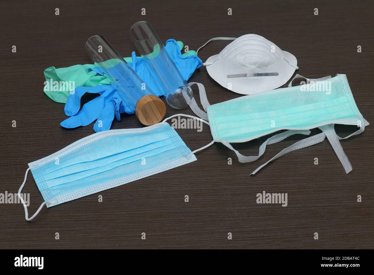 Medical equipment of face masks, gloves and test tubes used in ...