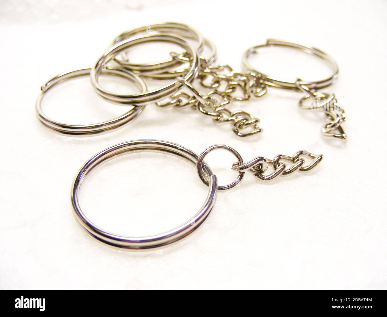 Metal ring and chain for key and trinket on white background Stock ...