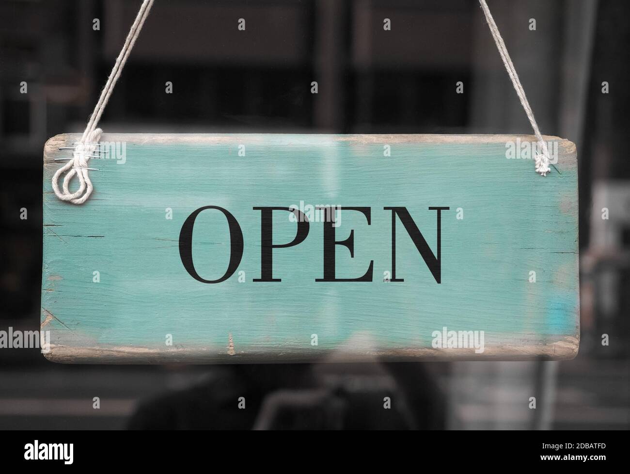 Open sign in a shop window with reflections Stock Photo - Alamy