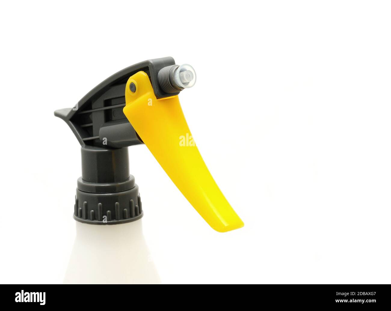 Closeup of plastic yellow grey nozzle head over white background Stock ...
