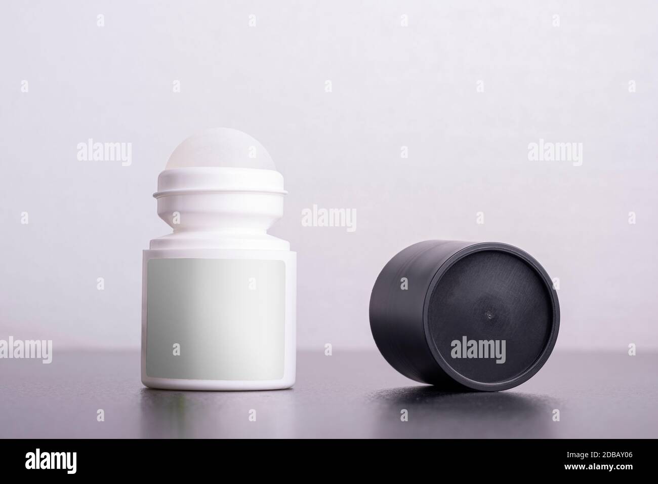 Roll on antiperspirant deodorant in front of white background, editable ...