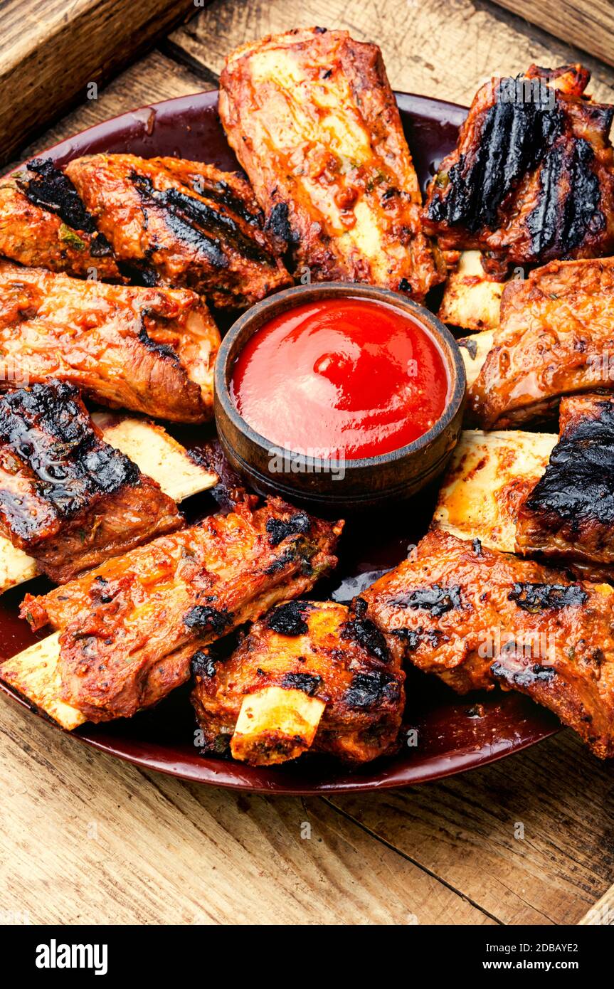 BBQ grilled ribs.Grilled juicy barbecue beef ribs in a plate Stock ...