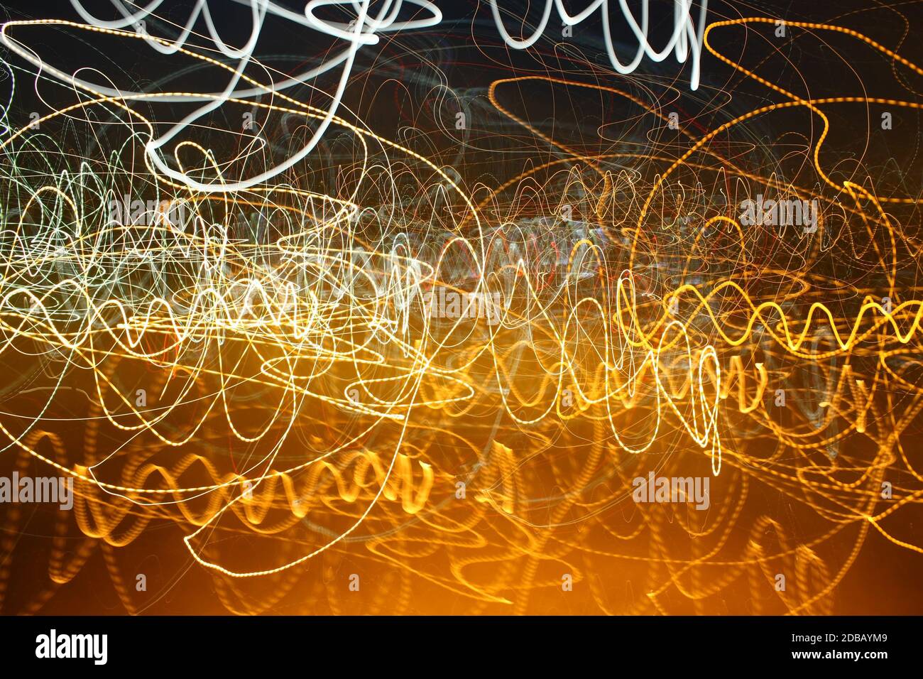 Abstract background, color lights into motion over dark Stock Photo - Alamy