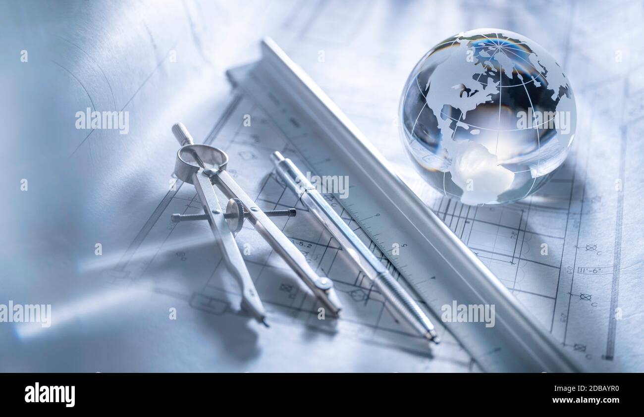 Glass globe and drawing equipment Stock Photo - Alamy