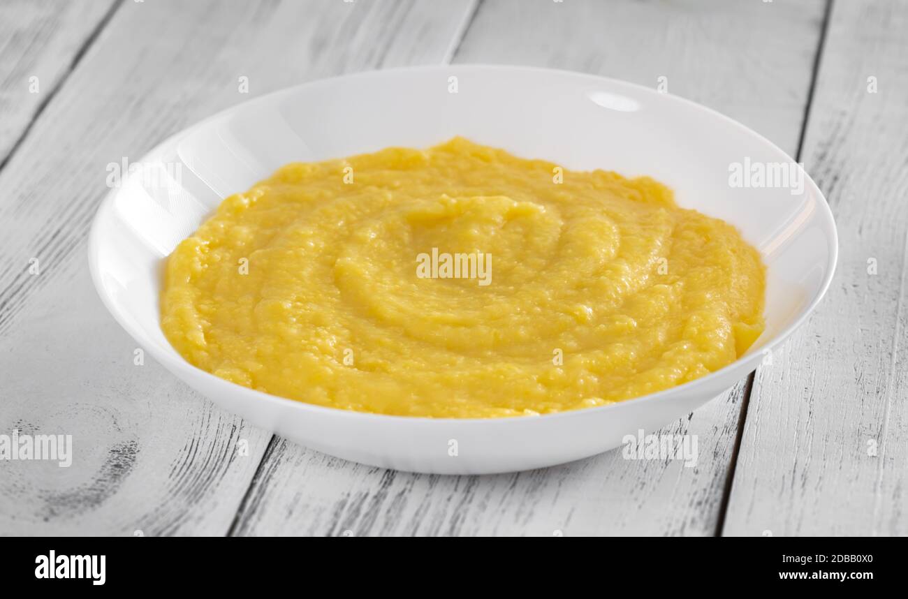 Italian traditional polenta, a dish of boiled cornmeal Stock Photo - Alamy