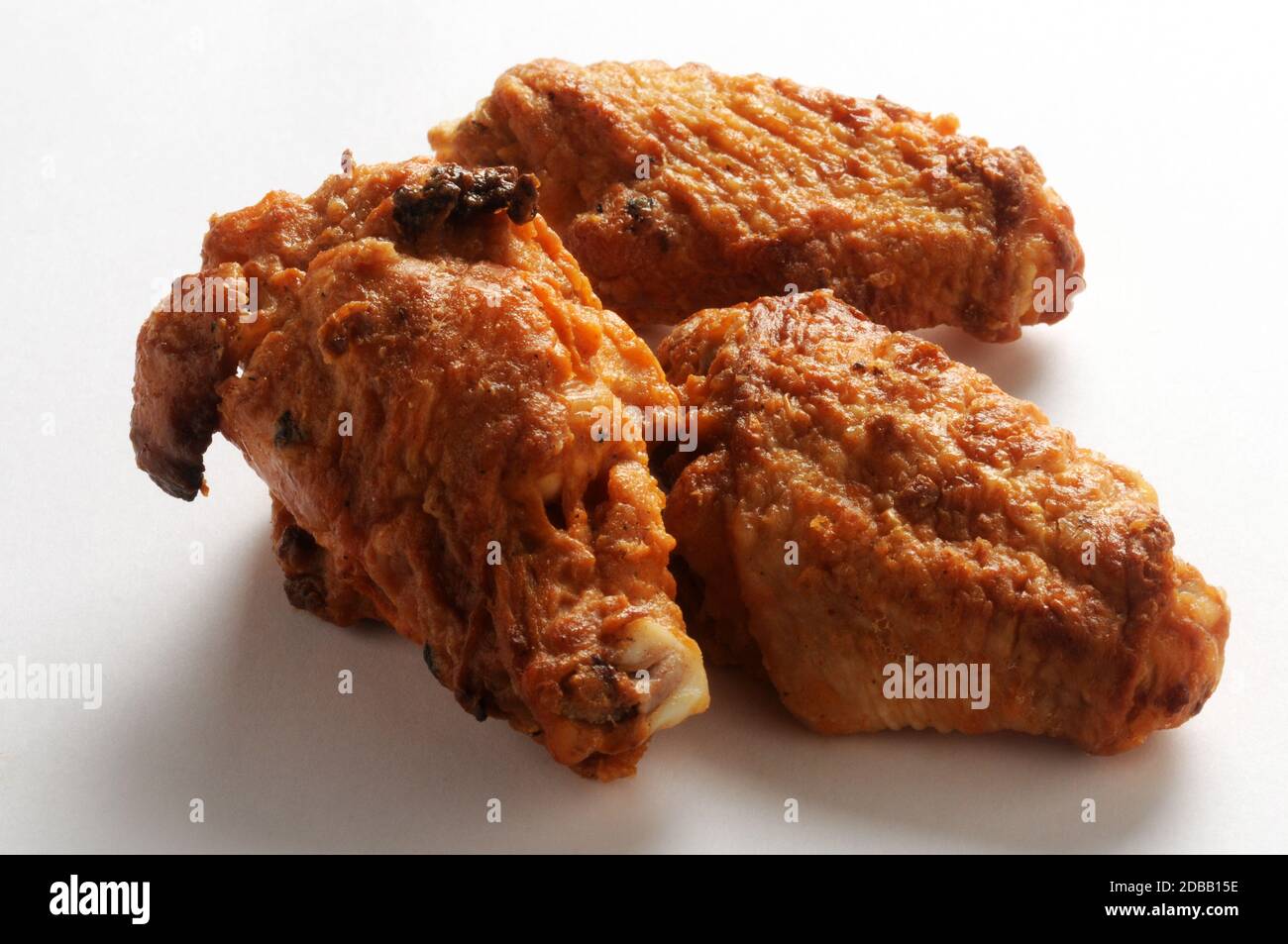 Baked chicken on white background Stock Photo - Alamy