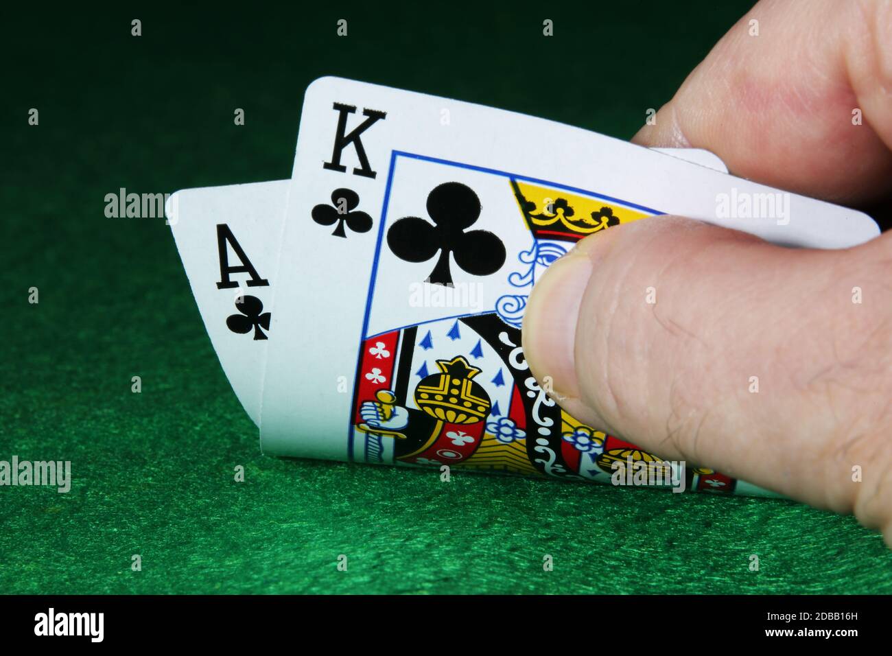 Checking the draw Ace King of Clubs cards poker Stock Photo - Alamy