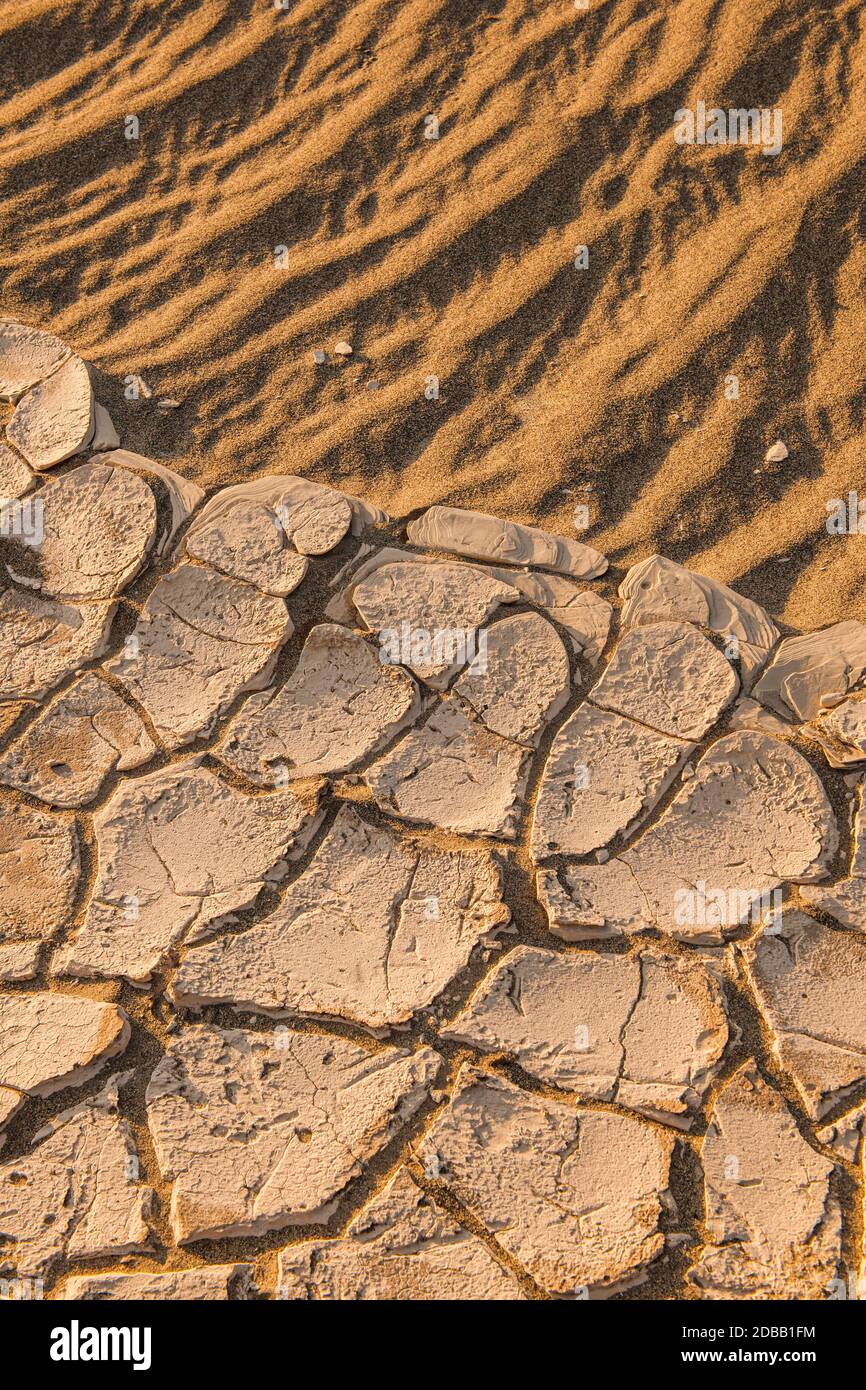 Cracked soil on desert Stock Photo - Alamy