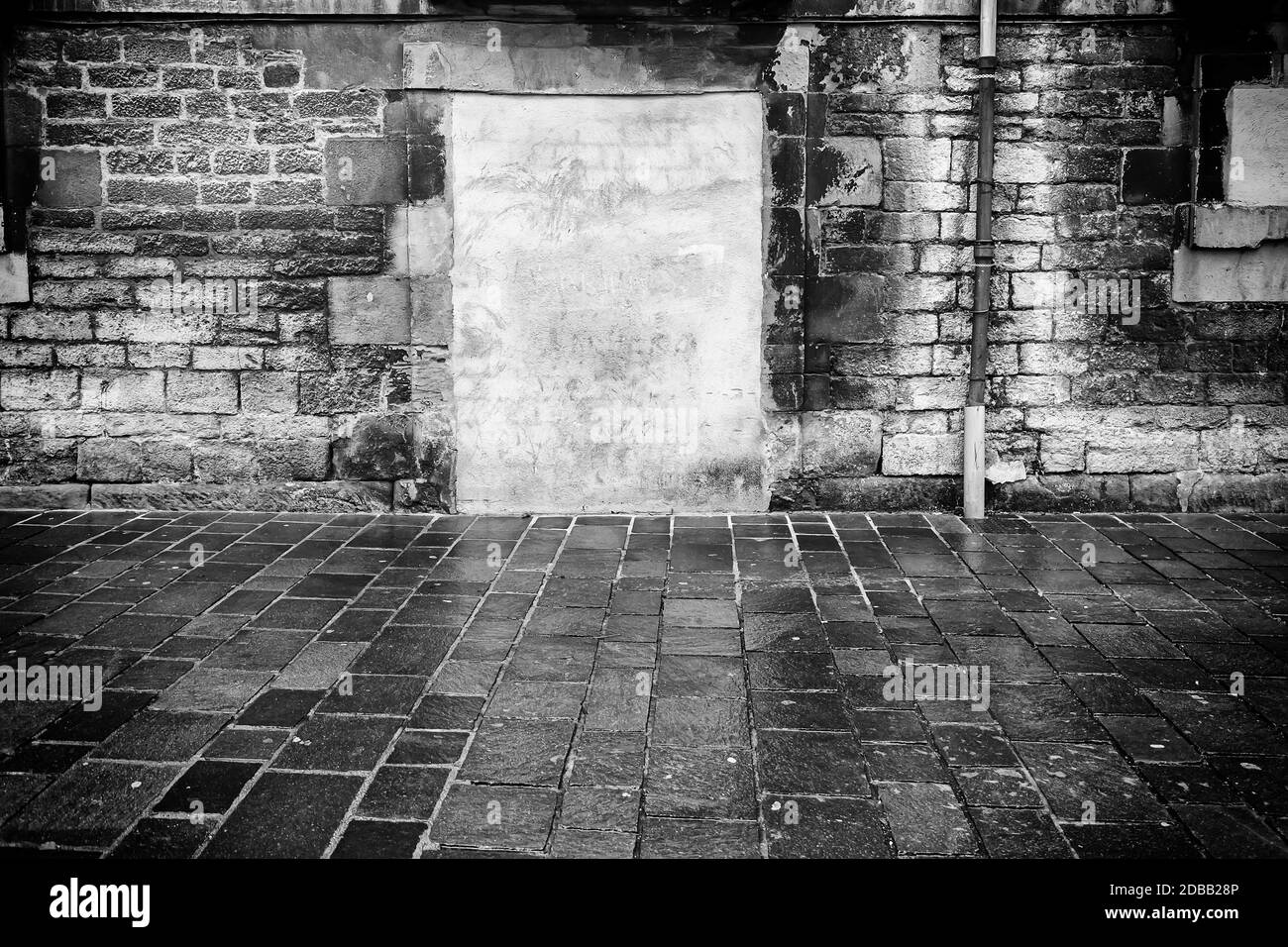 Old ruined wall with door Stock Photo - Alamy