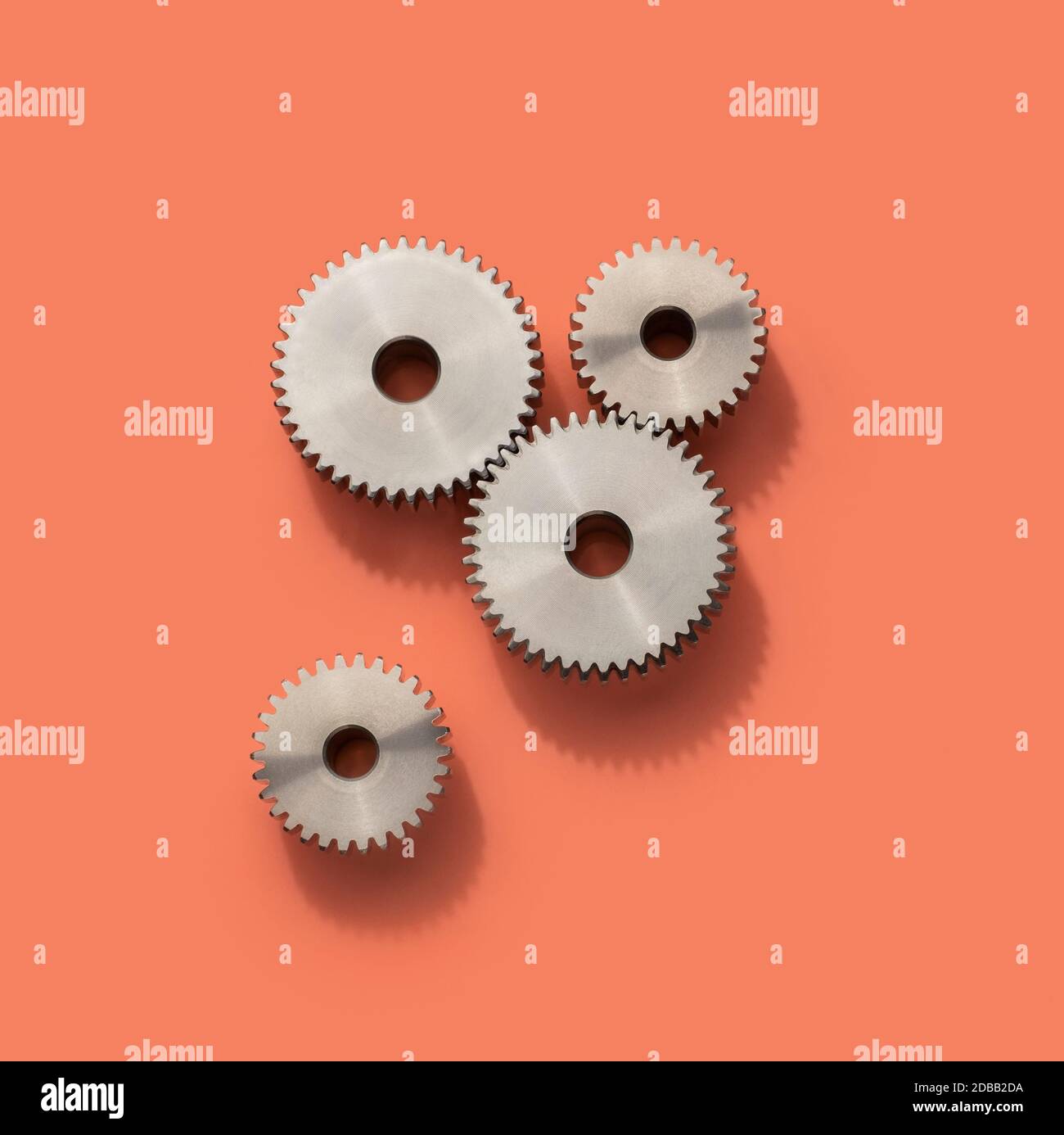 Cog wheels on pink hi-res stock photography and images - Alamy