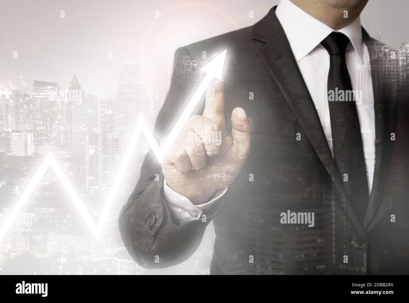 Businessman with city background showing stock market Stock Photo - Alamy