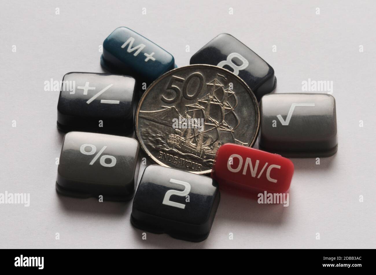 New Zealand coin with calculator keys Stock Photo - Alamy