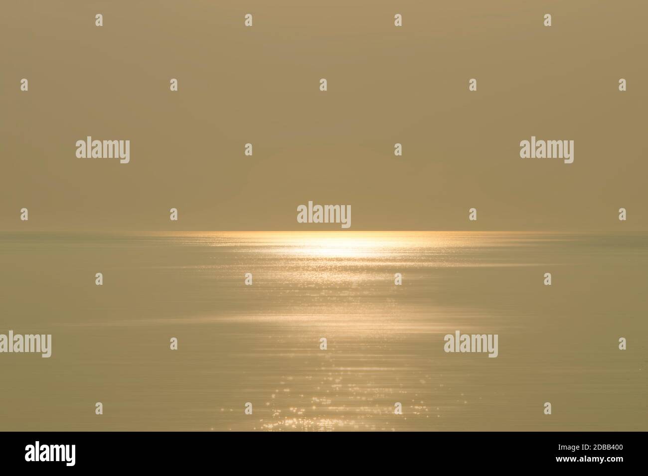 Calm sea and sky with sunlight Stock Photo - Alamy