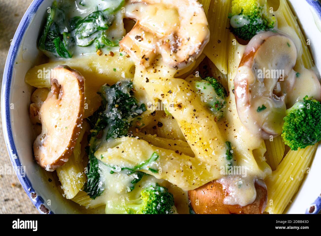Real pasta with mushrooms, spinach and broccoli Stock Photo - Alamy