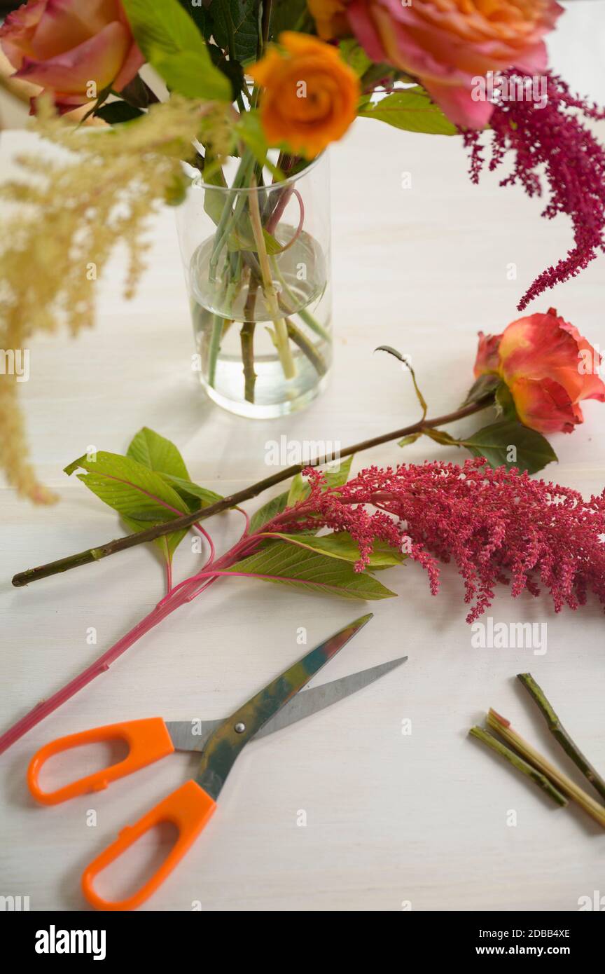 Floral arrangement and scissors Stock Photo - Alamy