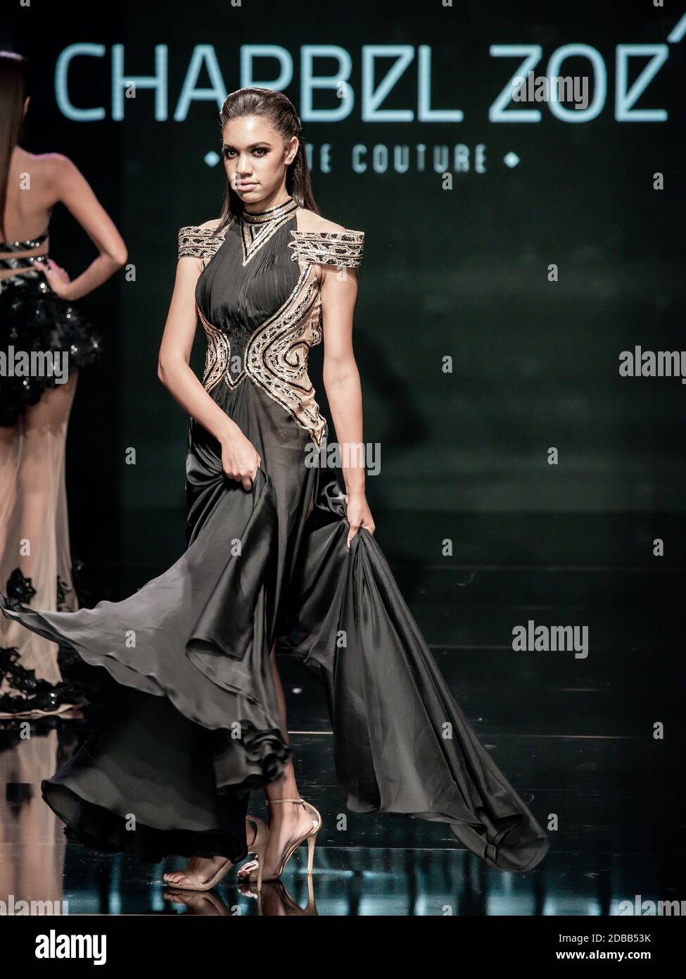 A model walks the runway for Charbel Zoe at Los Angeles Fashion Week S ...