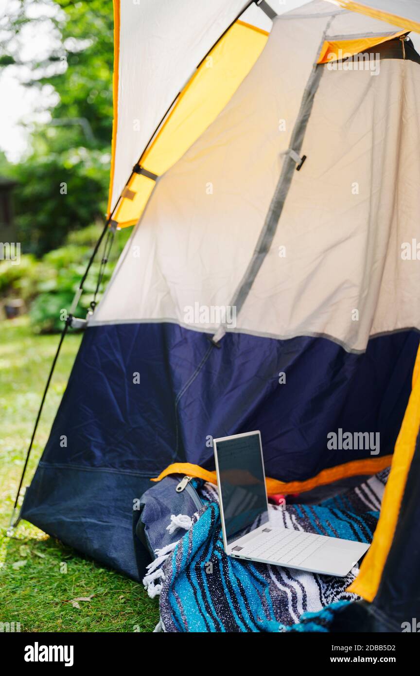 Laptop and tent hi-res stock photography and images - Alamy