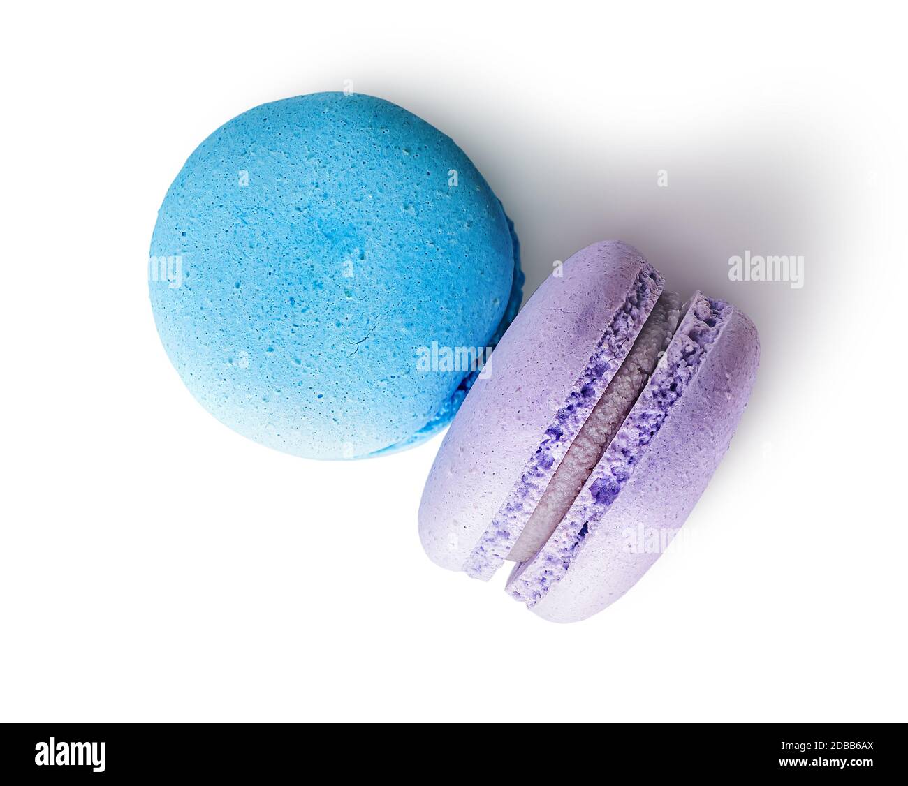 Two macaroon blue purple top view on white background Stock Photo - Alamy