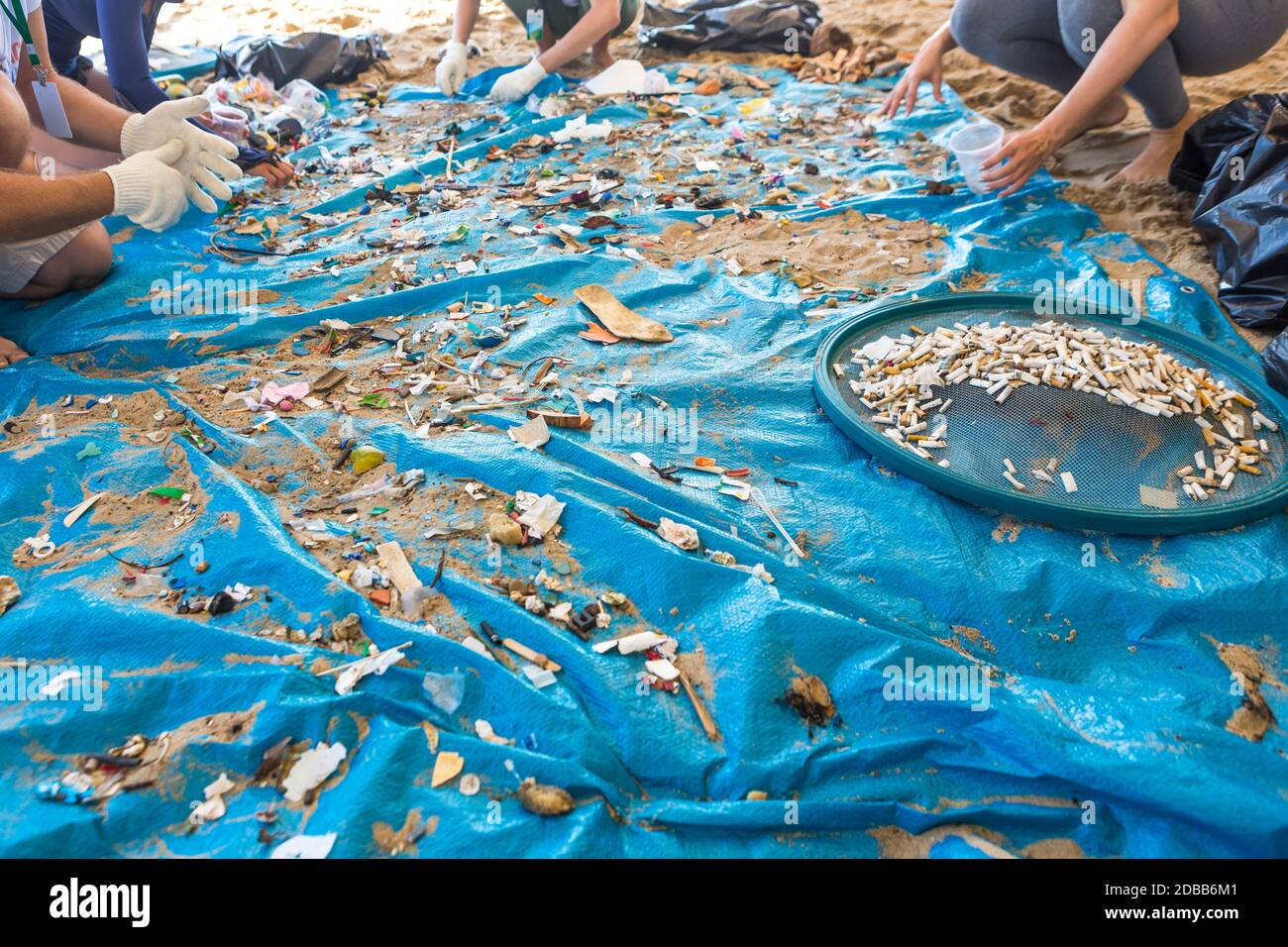 Beach Cleaning. Cleaning dirty beaches by the action of man ...