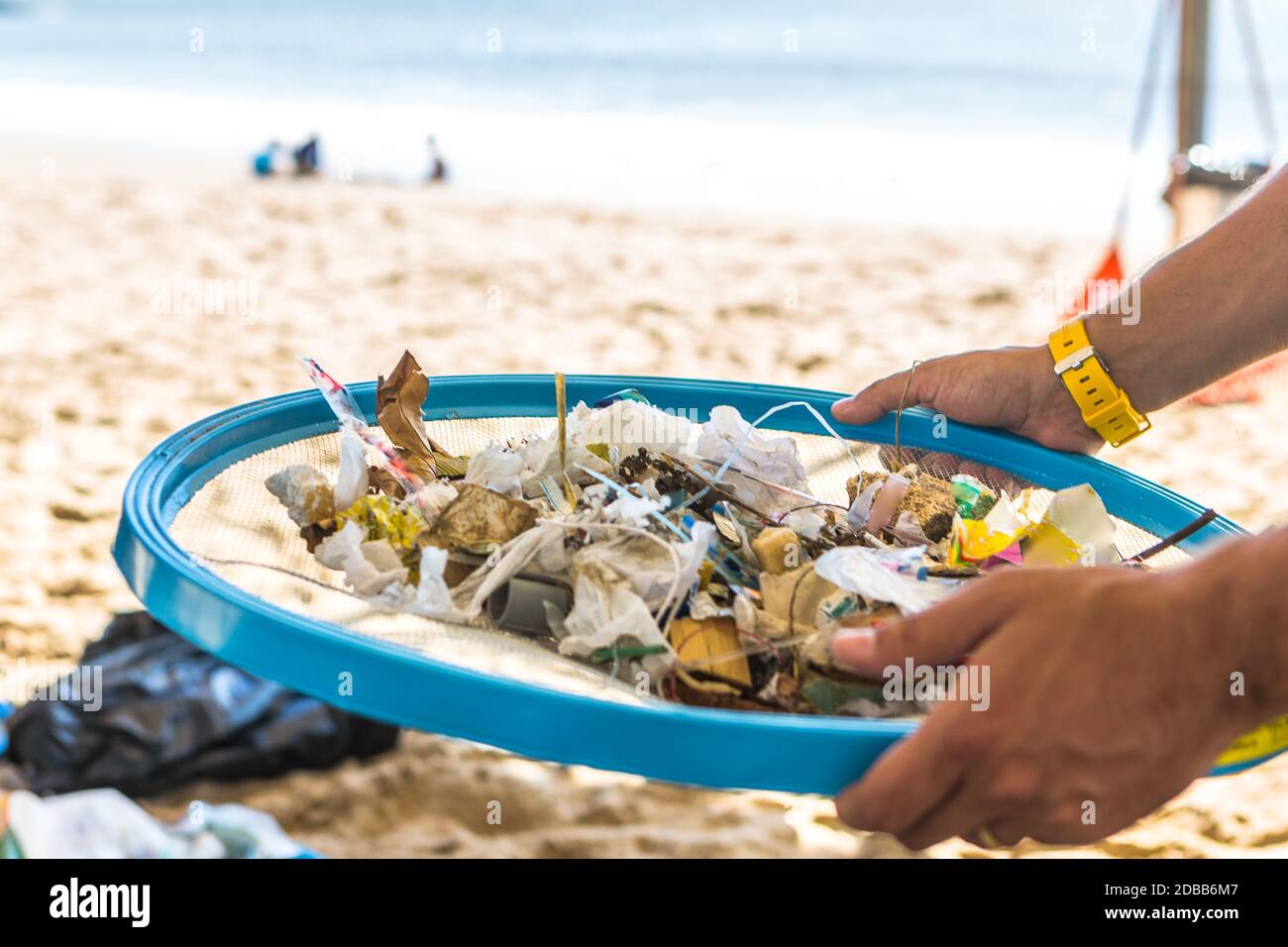 Beach Cleaning. Cleaning dirty beaches by the action of man ...
