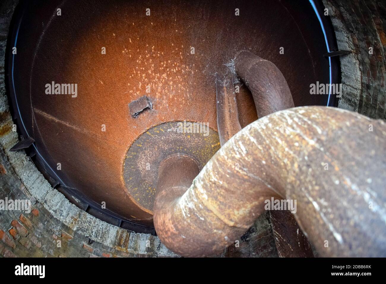 Water tank of an old water tower. Rusty tank and pipes of the water ...