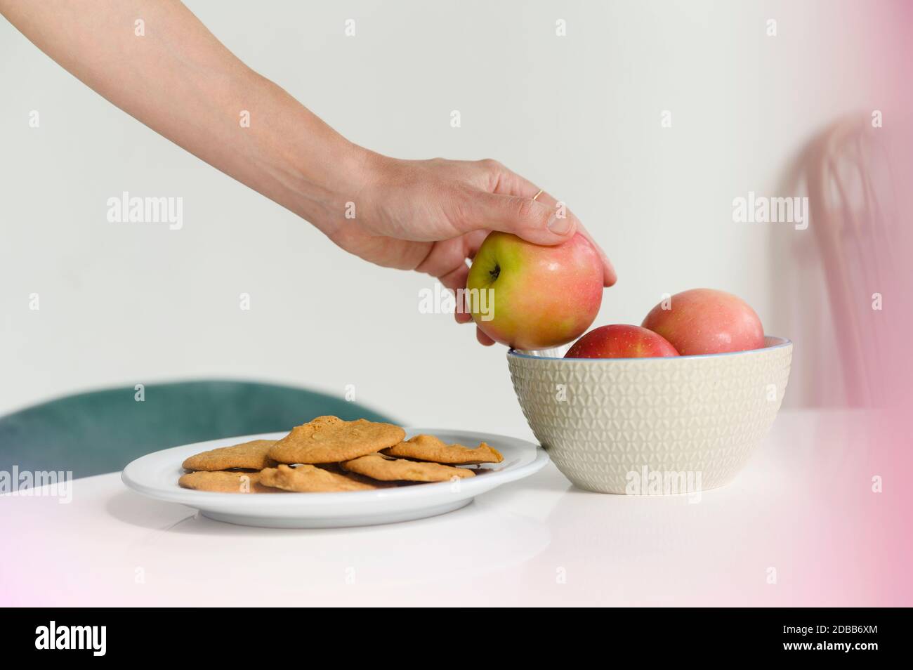 Hand woman choosing plate bowl hi-res stock photography and images - Alamy