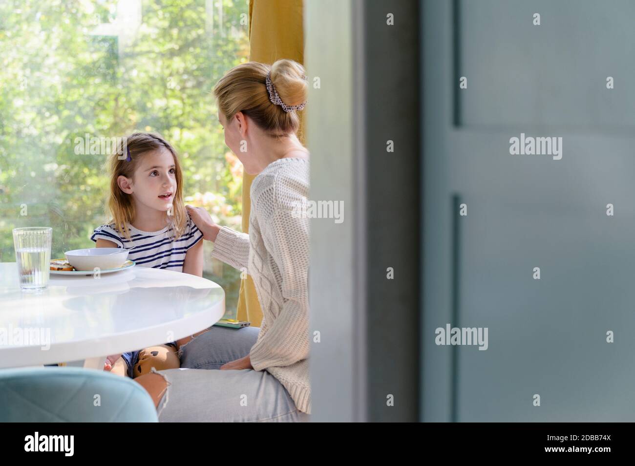Child talking to parent hi-res stock photography and images - Alamy