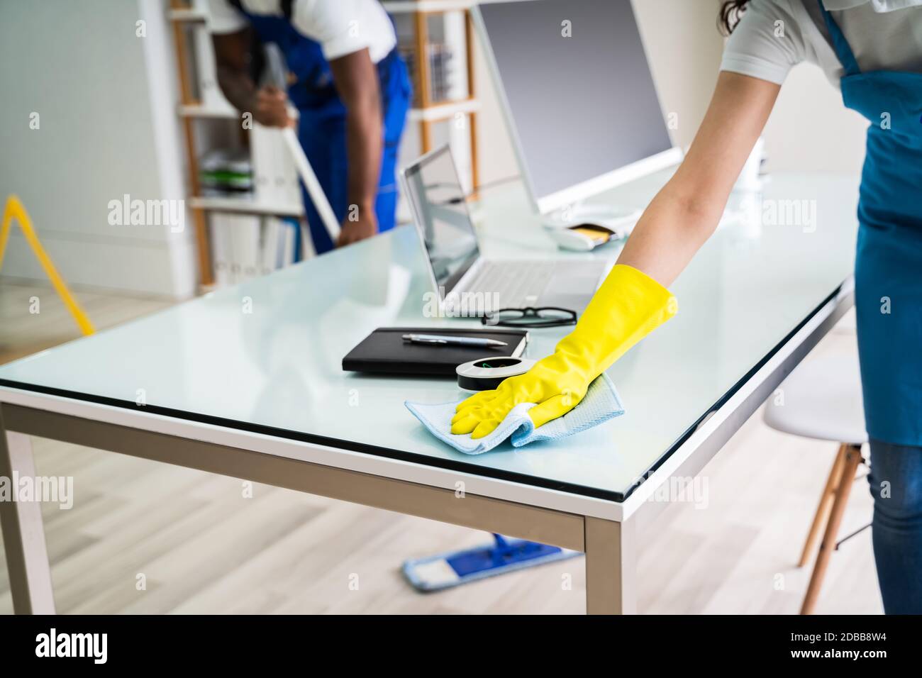 Male office cleaner black hi-res stock photography and images - Alamy
