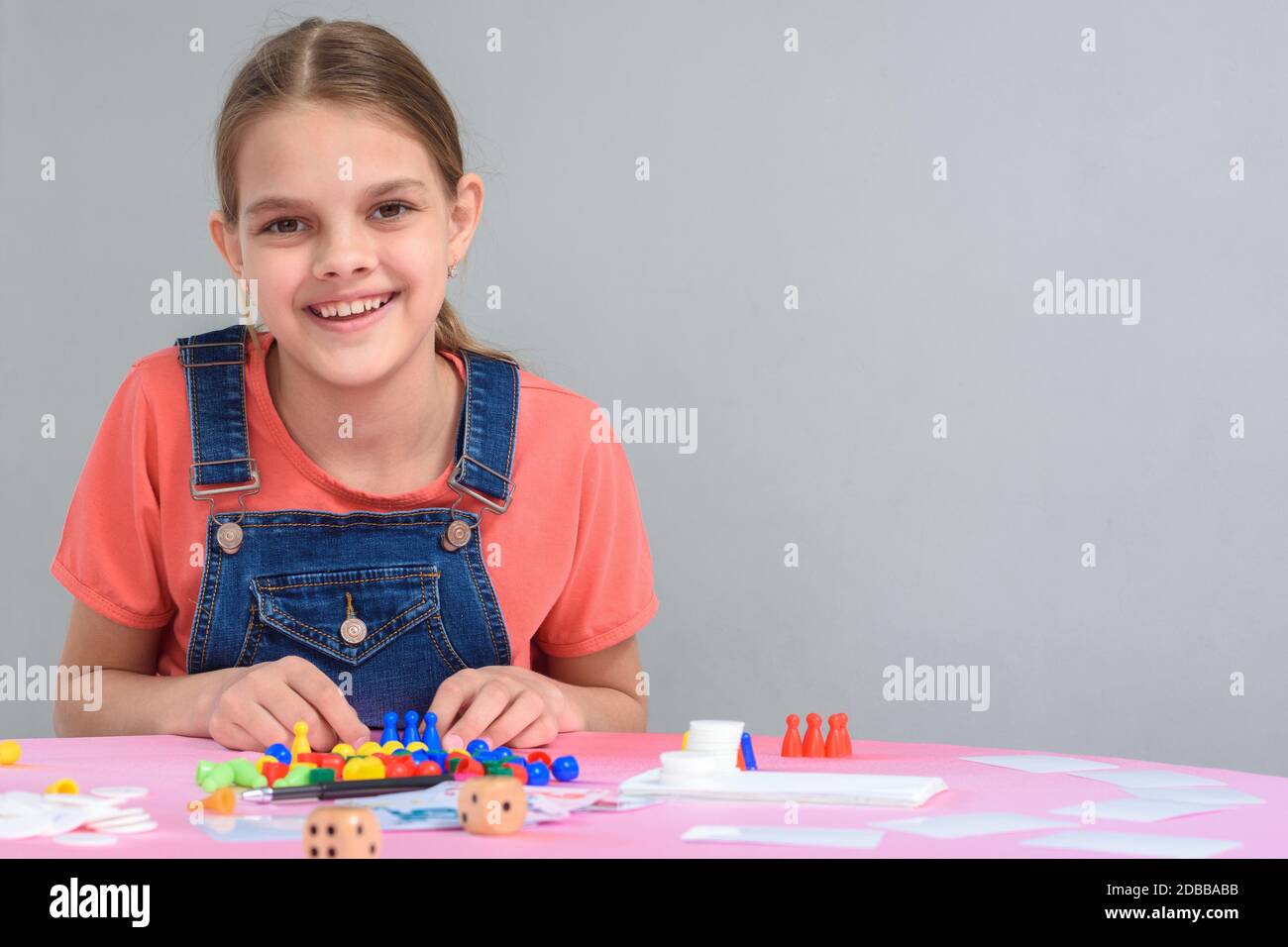 Girl sitting table in board hi-res stock photography and images - Alamy