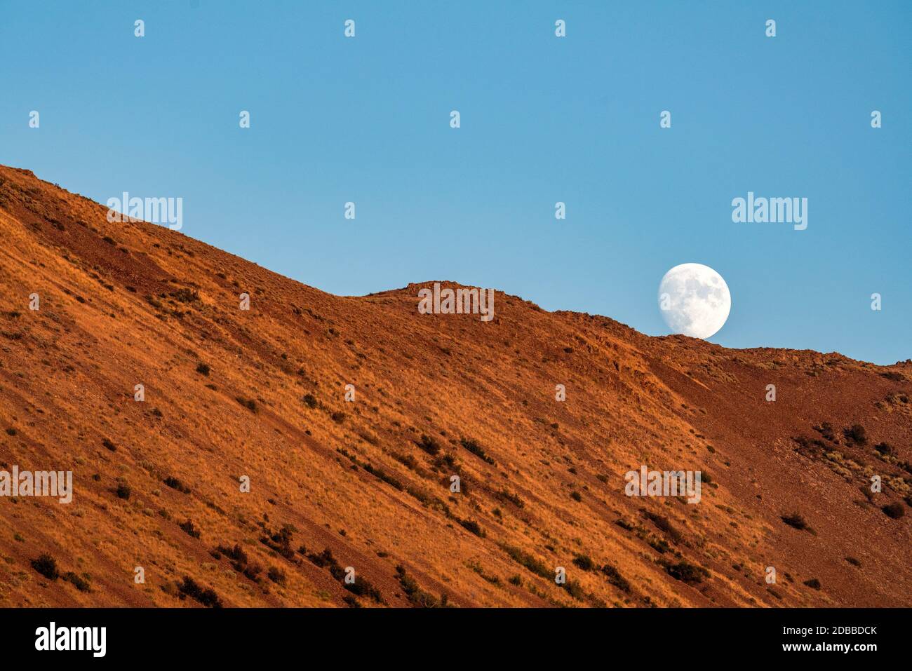 Moon in sky behind hi-res stock photography and images - Alamy