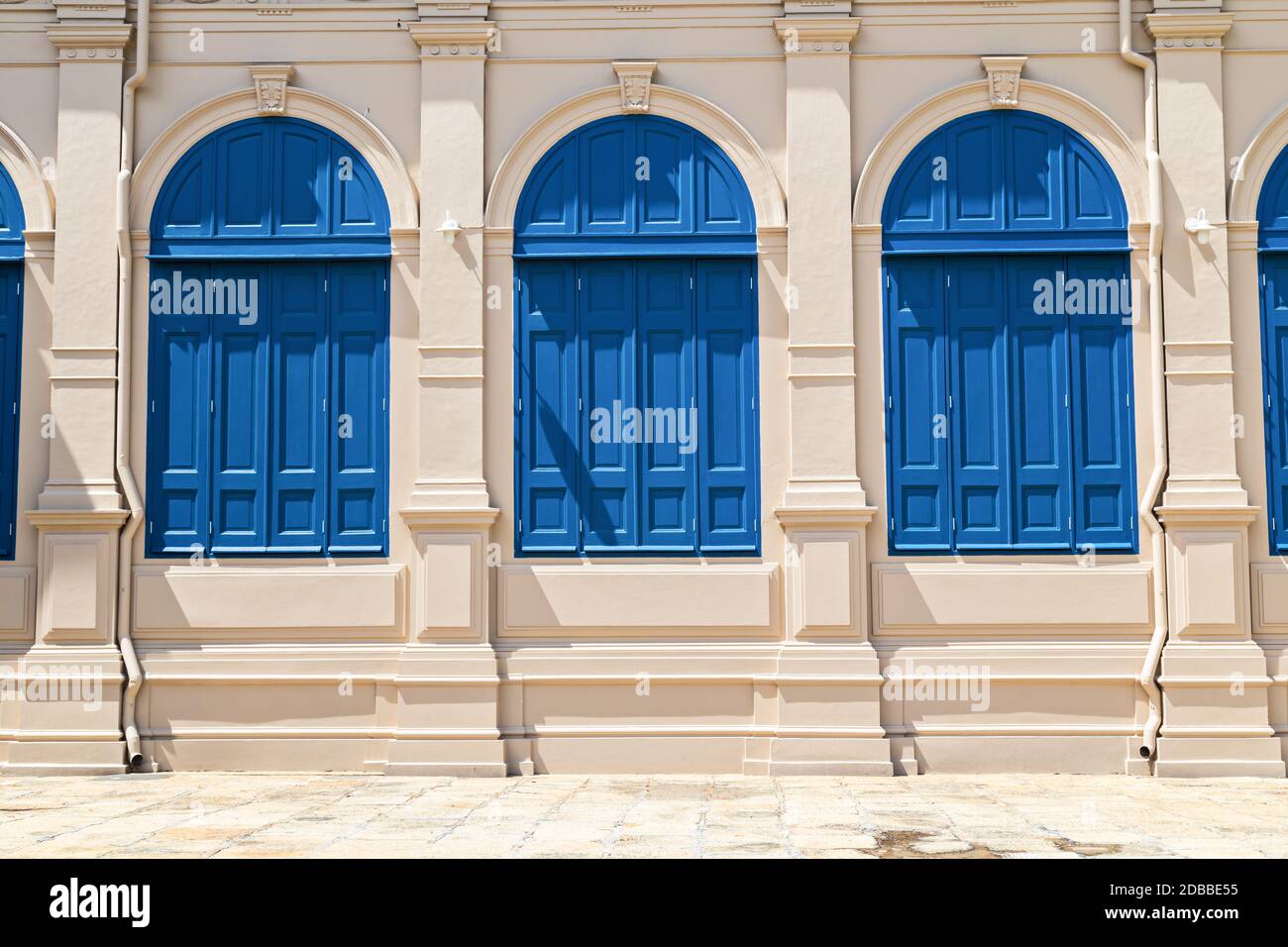 Blue vintage windows with wall Stock Photo - Alamy