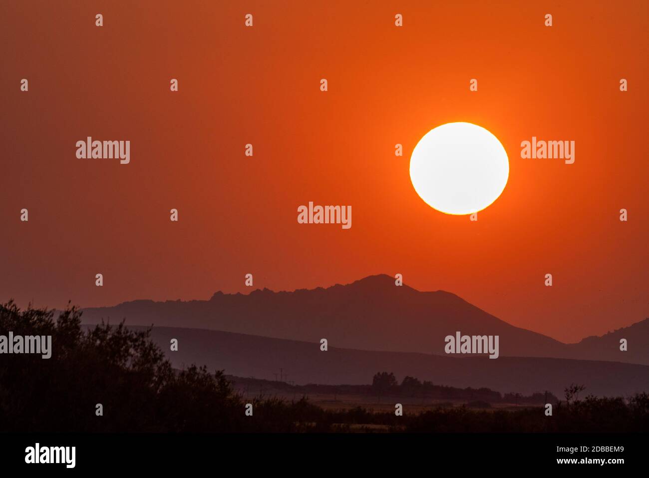 USA, Idaho, Bellevue, Sun setting over hills Stock Photo - Alamy