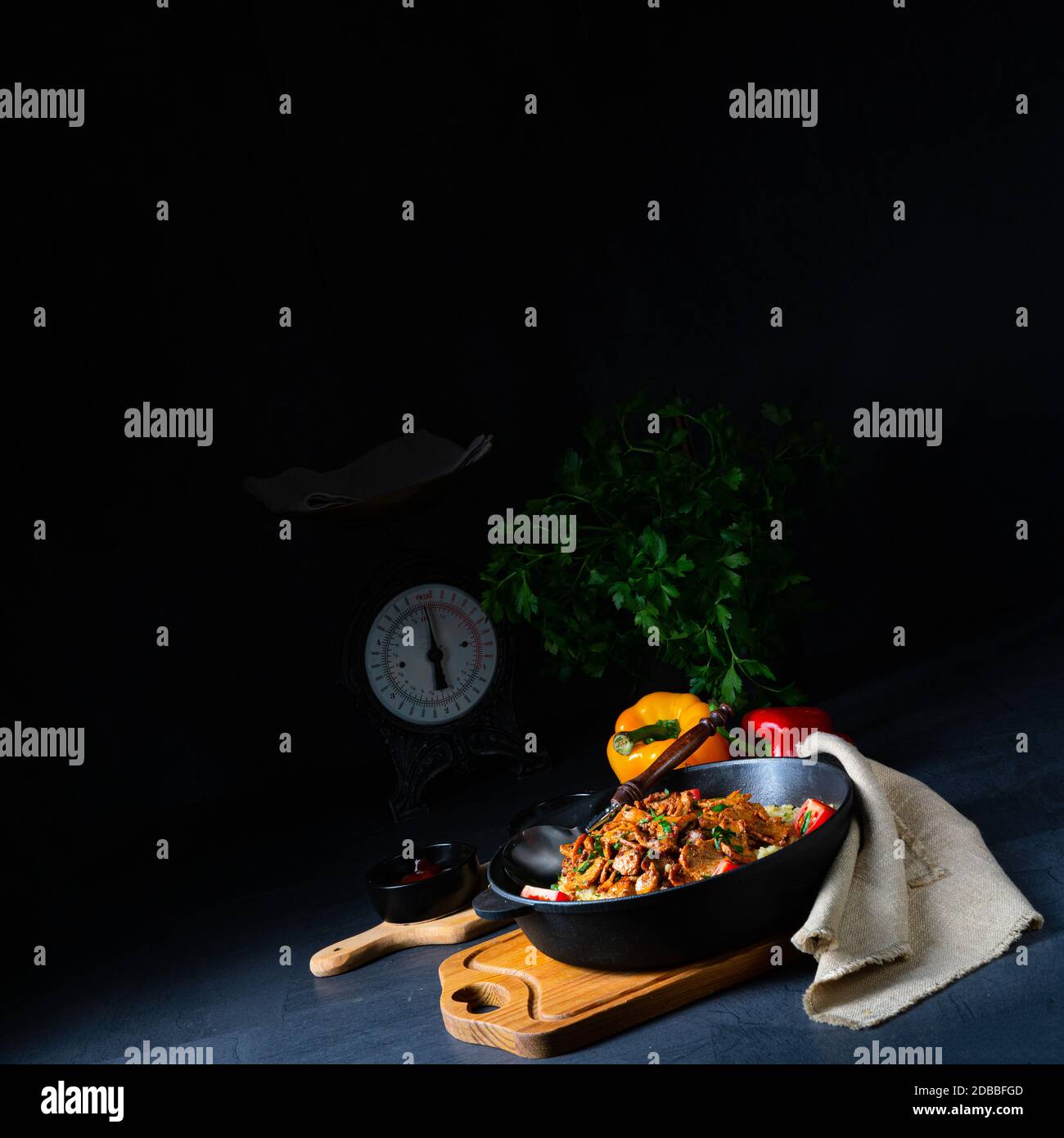 rustic bulgur pans with gratinated gyros and yoghurt Stock Photo - Alamy