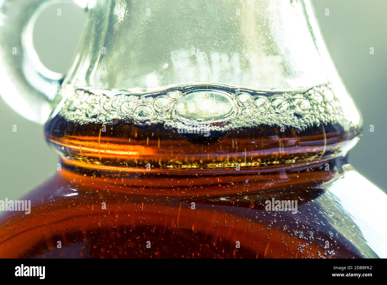 Maple syrup in a bottle in detail Stock Photo - Alamy
