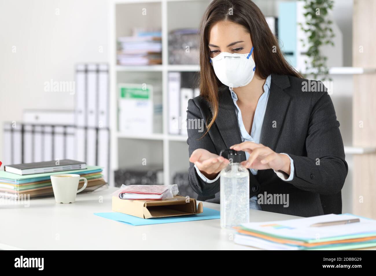 Executive cleaning hands after open a package avoiding coronavirus ...