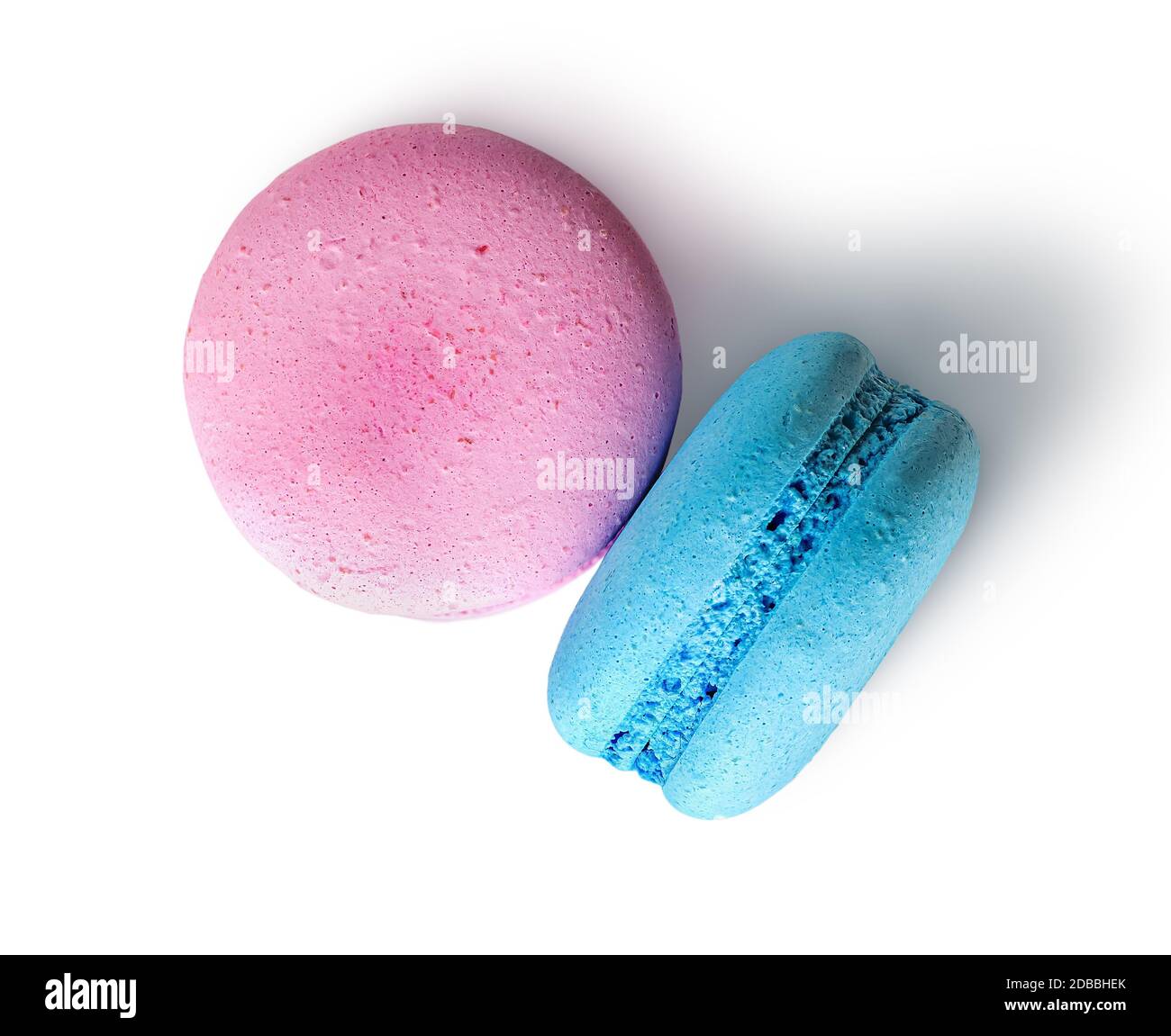 Two macaroon pink blue top view on white background Stock Photo - Alamy