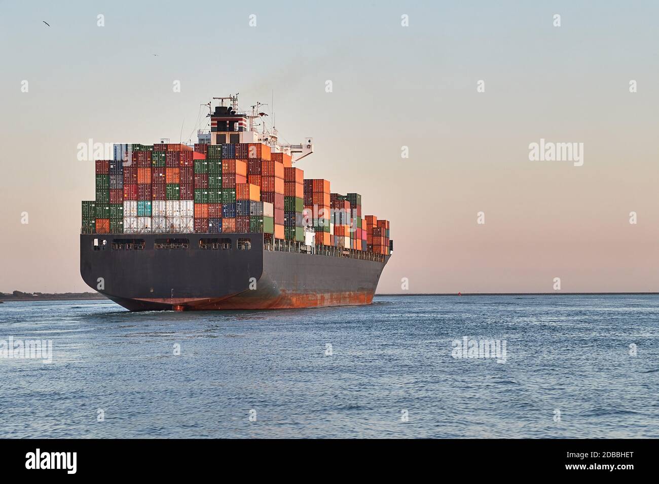 Container ship heading out to sea hi-res stock photography and images ...