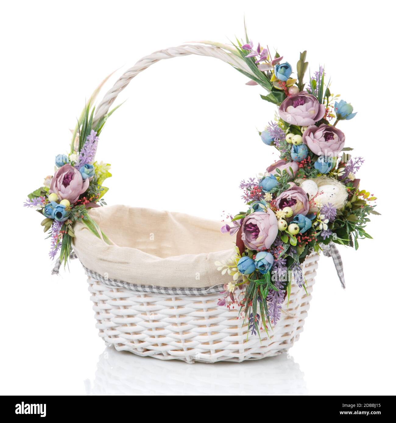Decorative white wicker basket with fabric inside. Decorating a ...