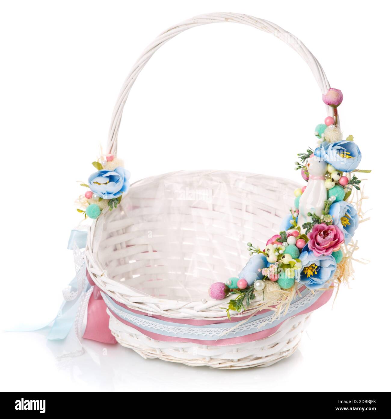 Beautiful floral arrangement on a little baby wicker basket. Floral ...