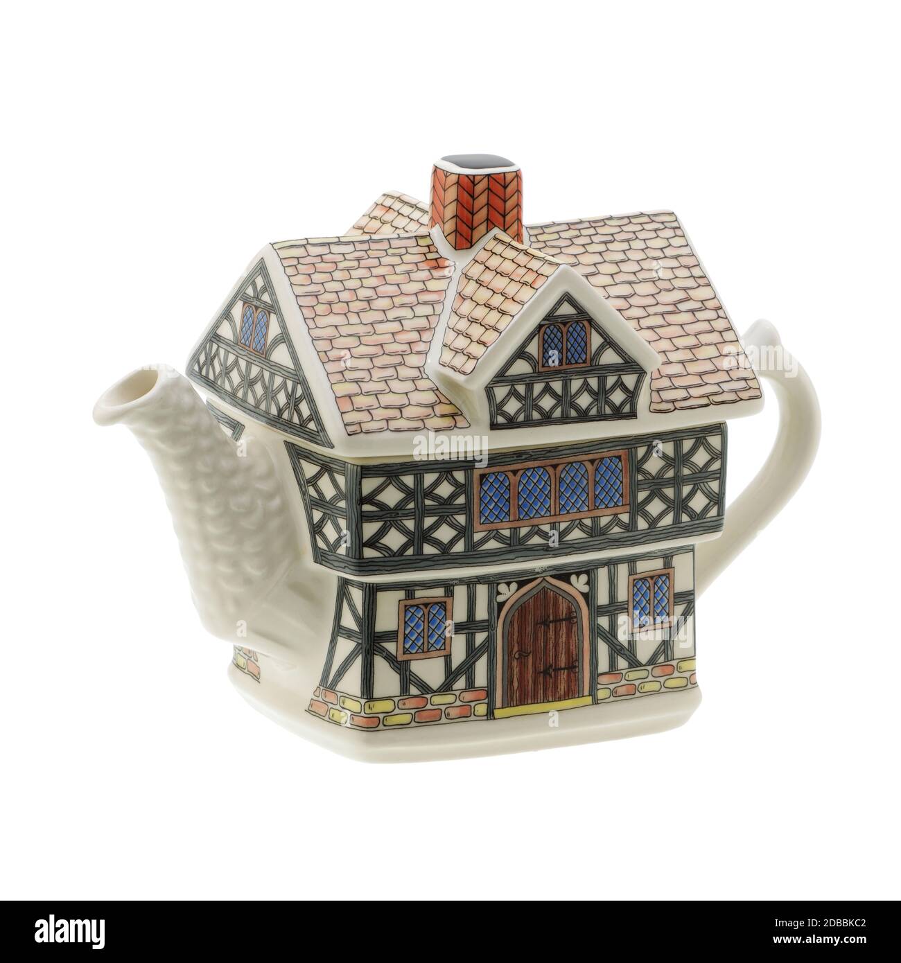 A house shaped teapot on white background with clipping path Stock ...