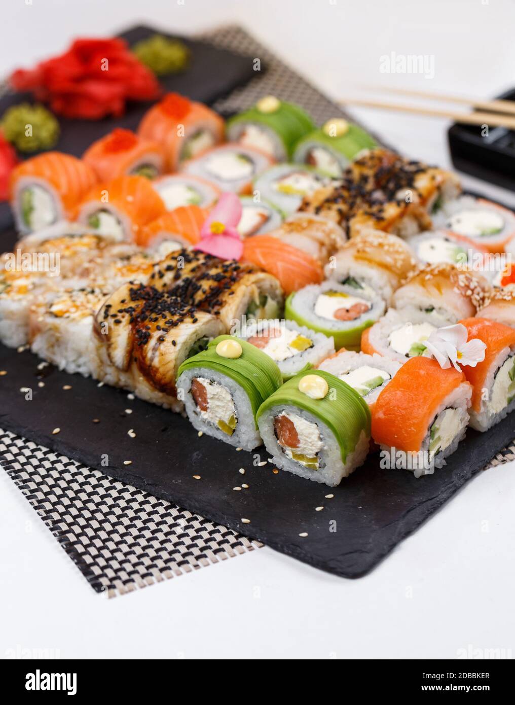 Set of sushi. Different types of Maki and Nigiri sushi with ginger and ...