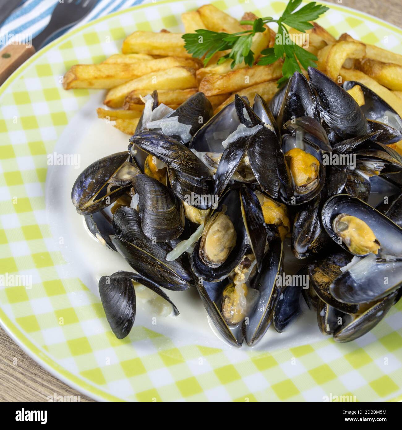 baked mussel with fries Stock Photo - Alamy