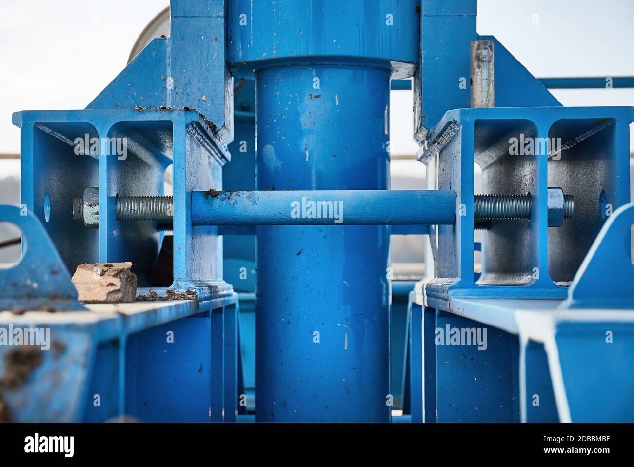 Industrial metal structures at a dam, steel metal beams, axles fixed by ...