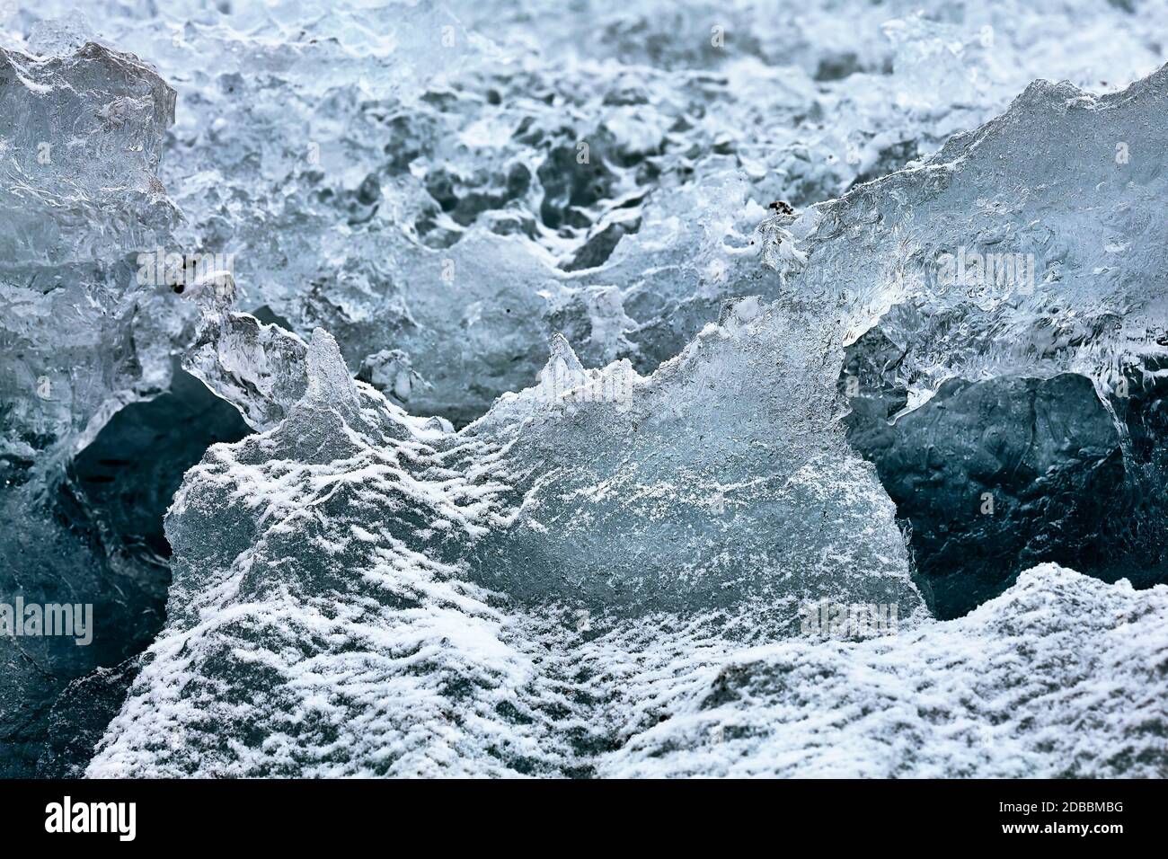 Ice blocks melting off an iceberg, icy glacial shapes forming Stock ...