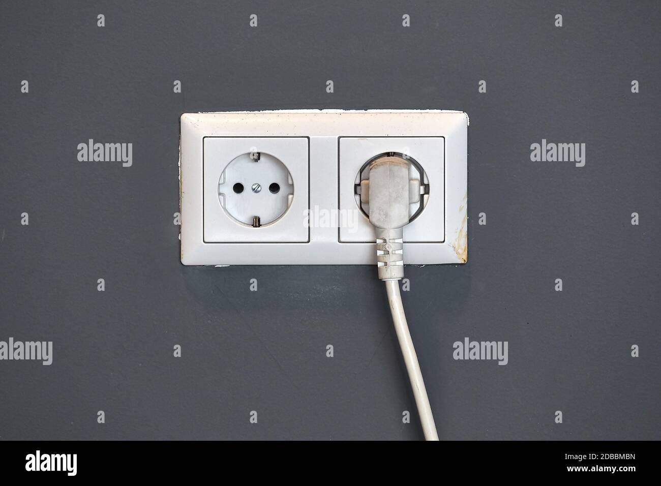 Electric outlet with cable connected, European Type F socket and plug ...