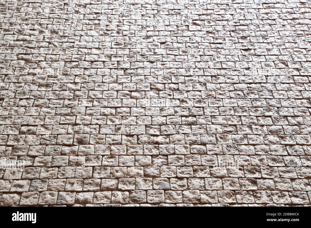 Pavement made of old stones, small cobbles Stock Photo - Alamy