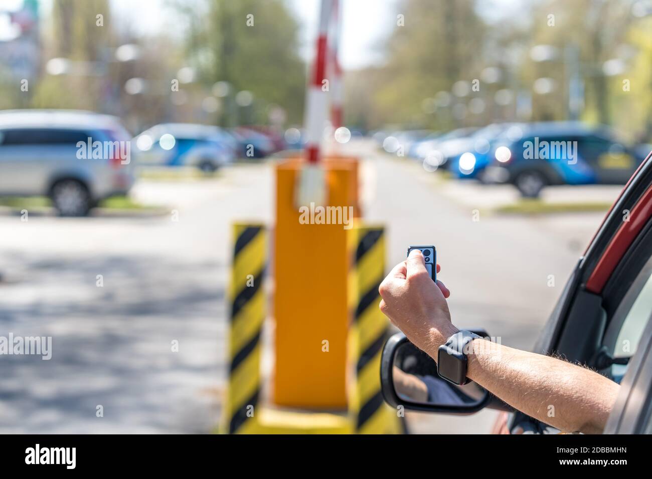 lifting the barrier in the parking lot with the help of remote control ...