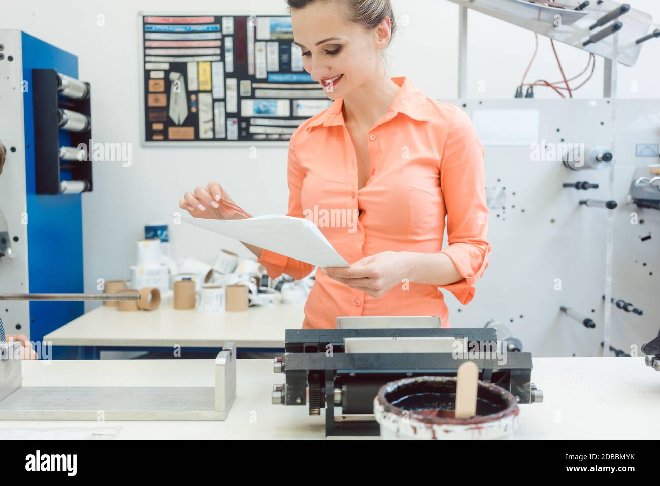Worker checking label machine hi-res stock photography and images - Alamy